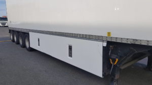 What does side underrun protection do on trucks and trailers?
