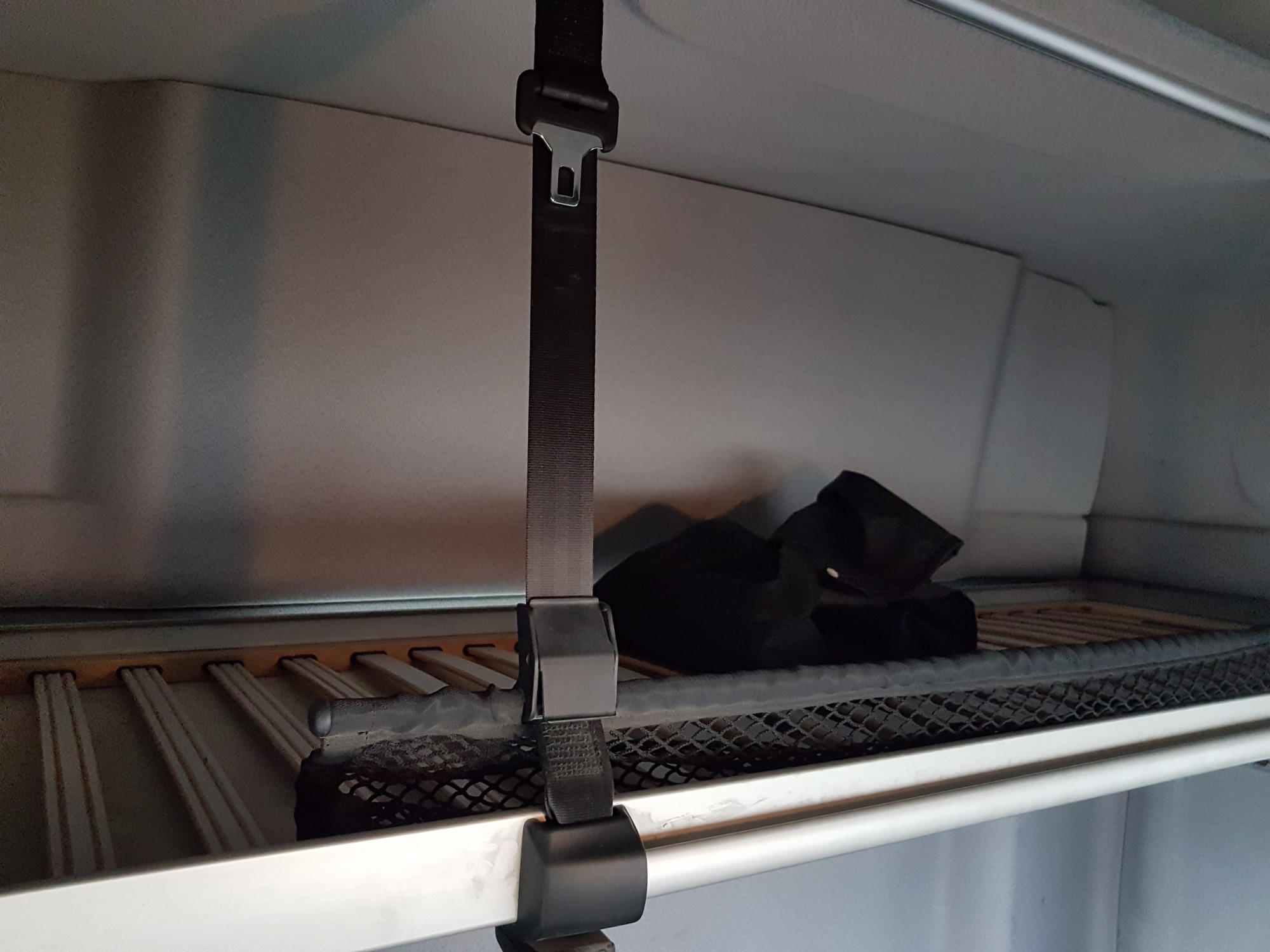 What should you check inside your truck's cab in a pre-start inspection?