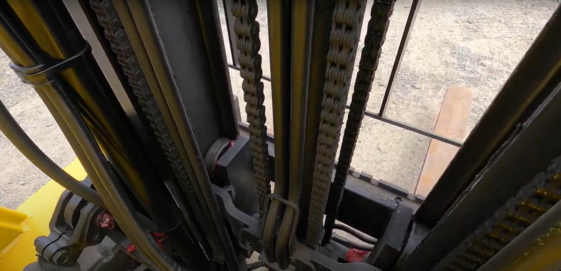 Why do hydraulic hoses fail and how can you check them?